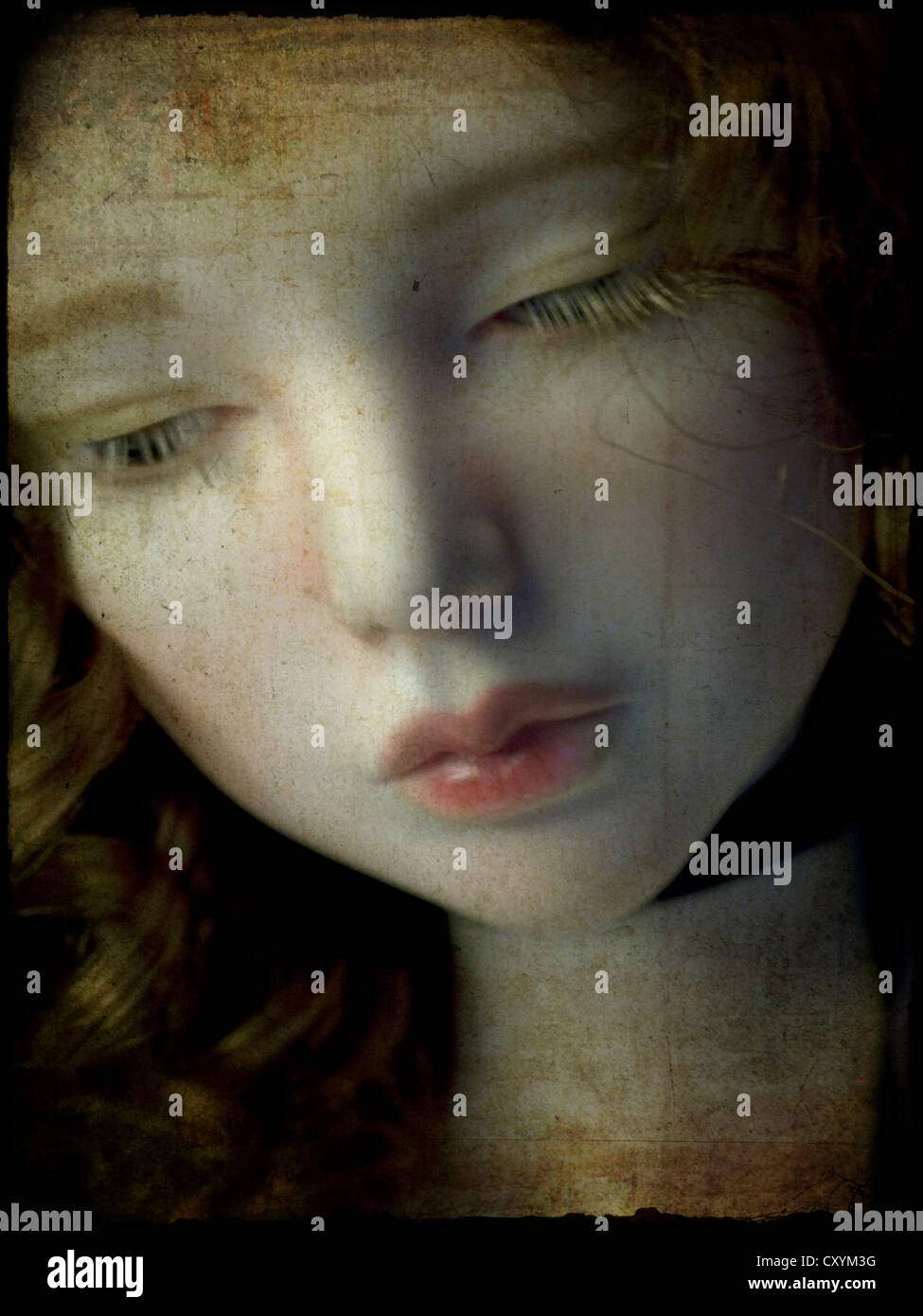 Close up of dolls face looking upset Stock Photo - Alamy