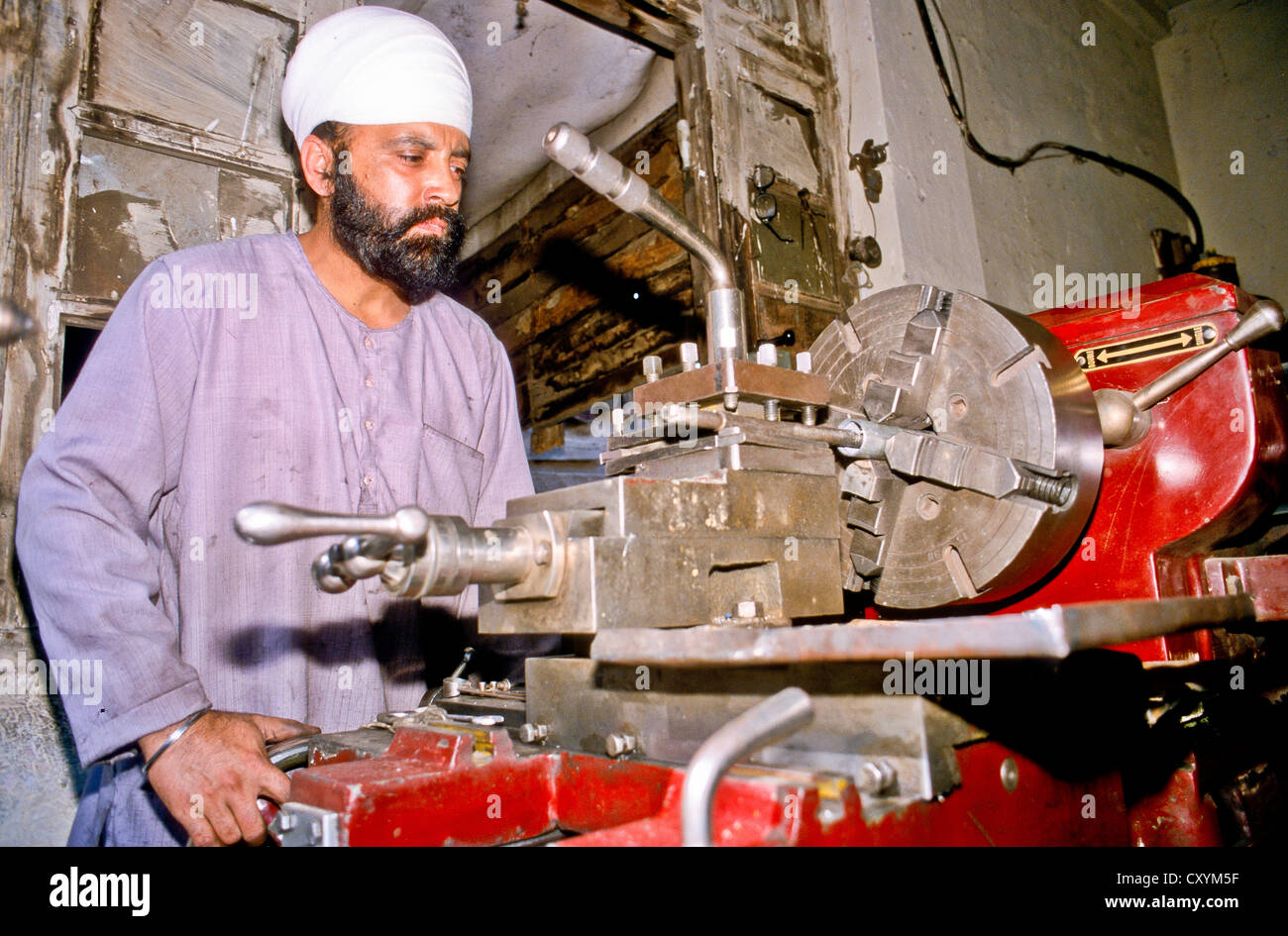 Mechanic working at a lathe, Mandi, India, Asia Stock Photo - Alamy