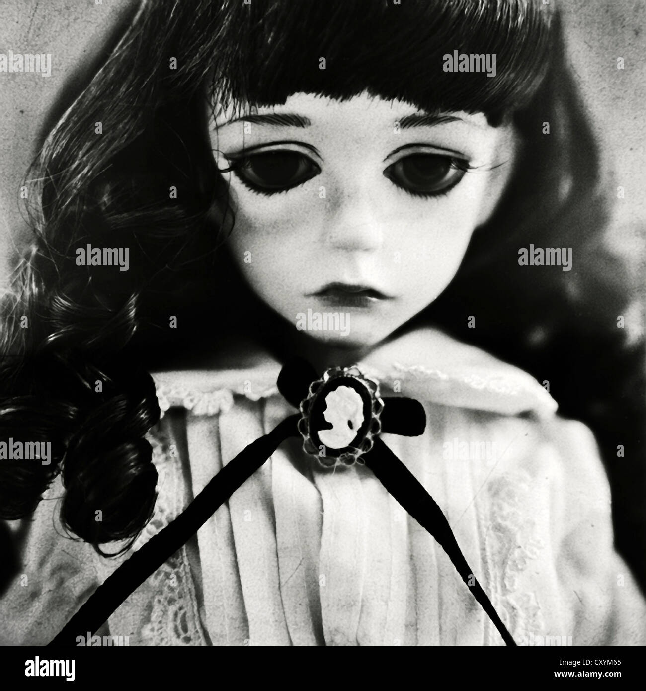 Close up of dolls face looking upset Stock Photo - Alamy