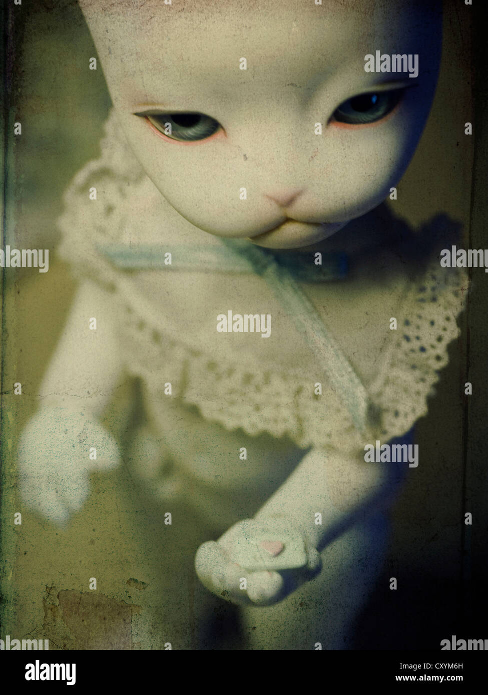 Close up of dolls face looking upset Stock Photo - Alamy