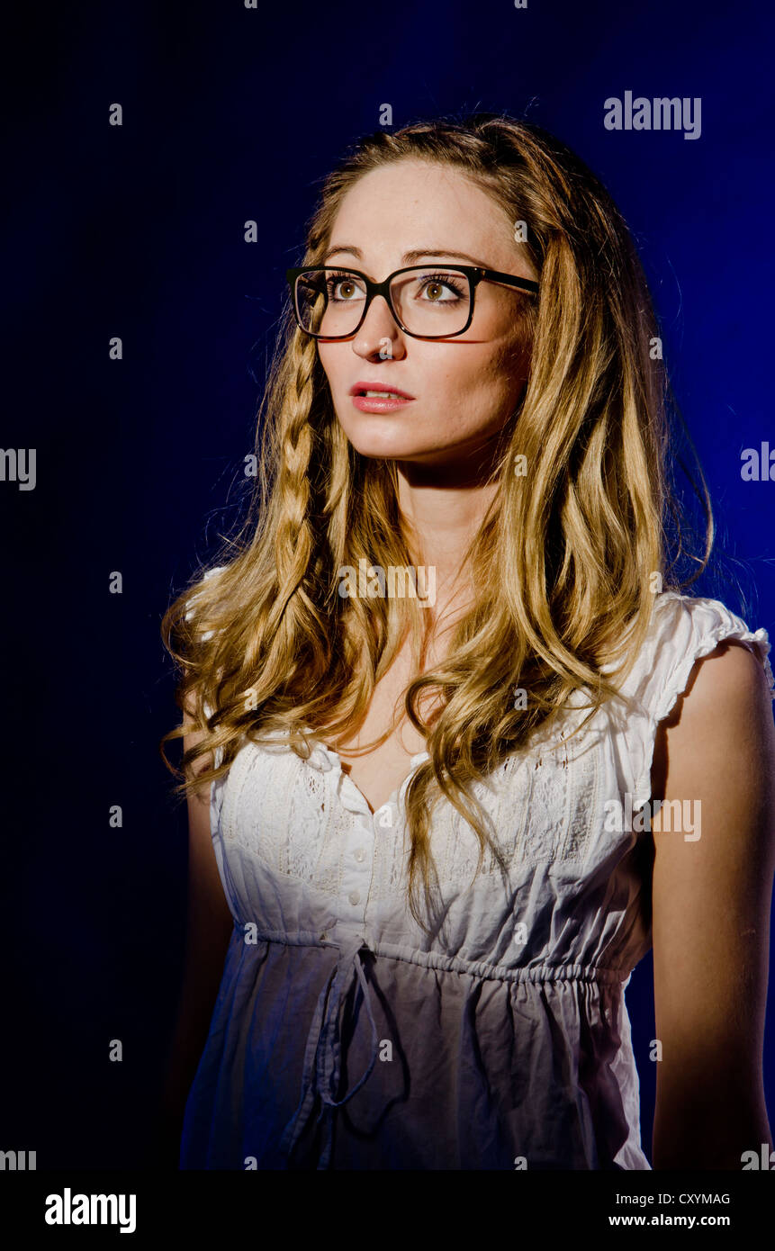 Young woman, 25, in the spotlight Stock Photo - Alamy