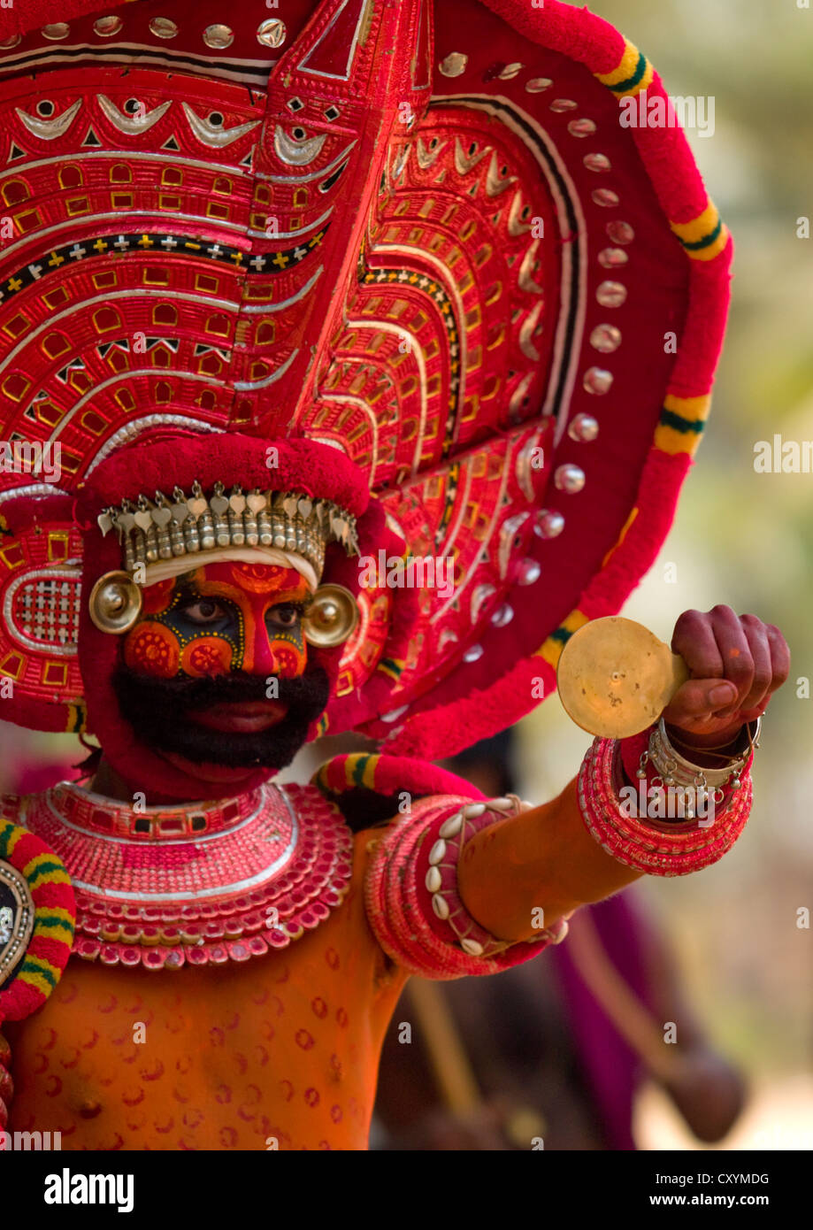 Man Dressed For Theyyam Ritual With Traditional Painting On His Face ...
