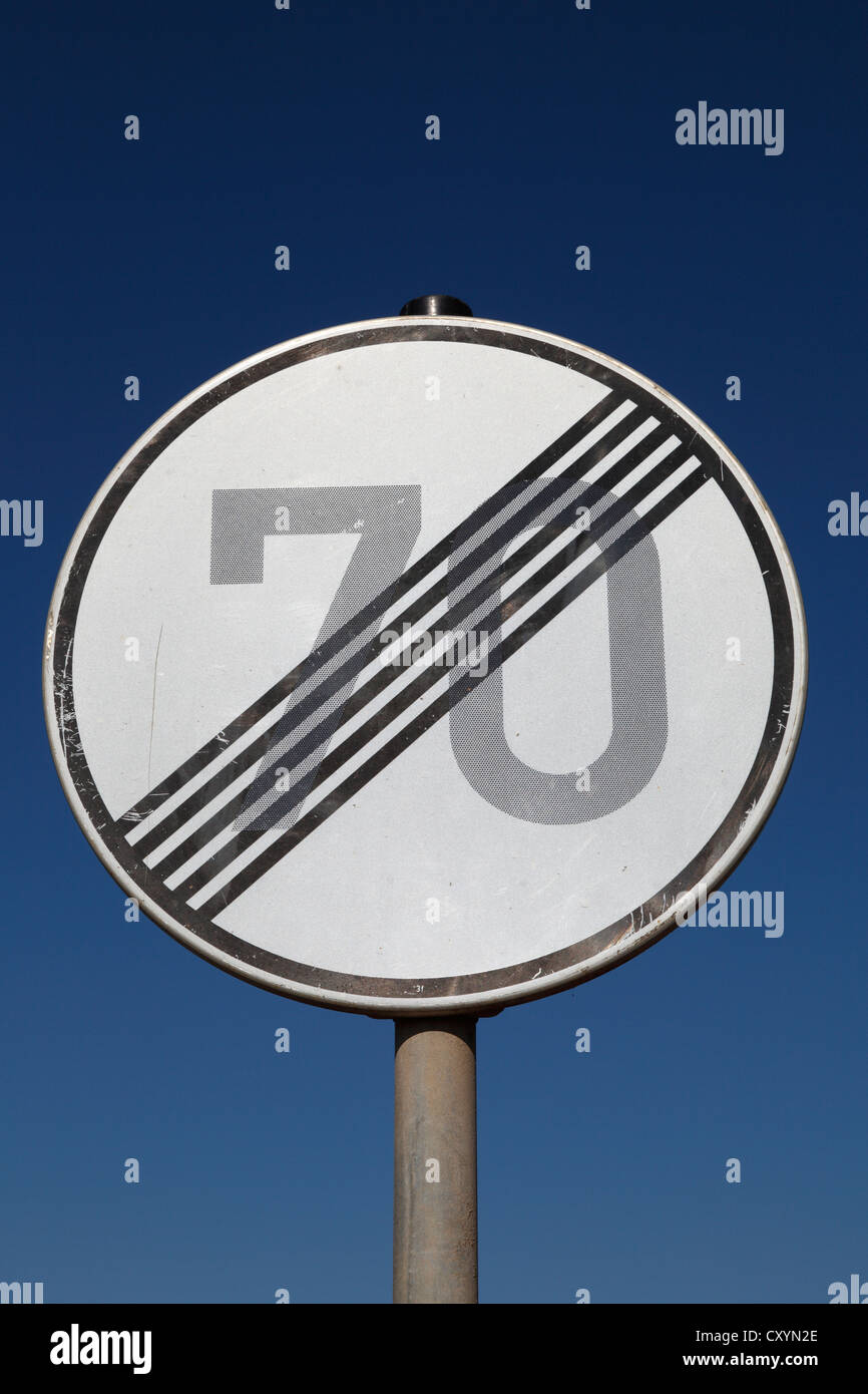 Traffic sign, end of the 70 km/h speed limit zone Stock Photo - Alamy