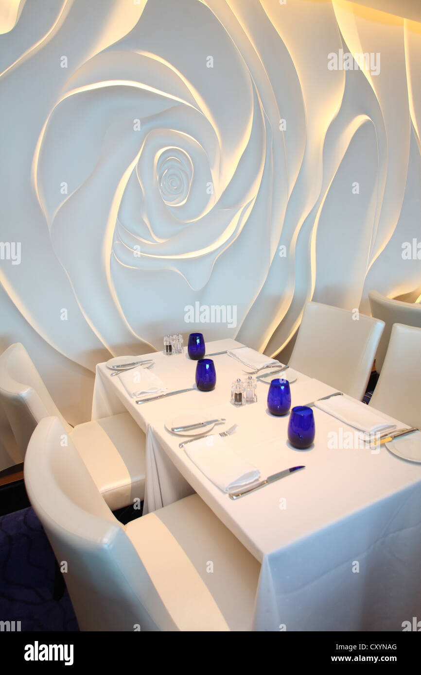 Table and chairs in Blu restaurant, part of specialty dining on cruise ...