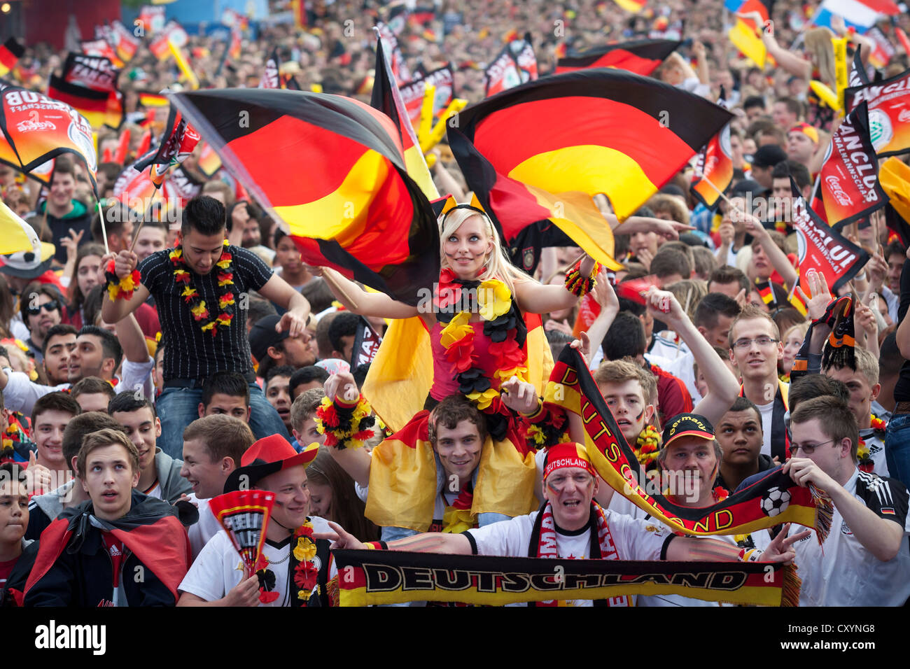 Football fans watching the second match of the German national team ...