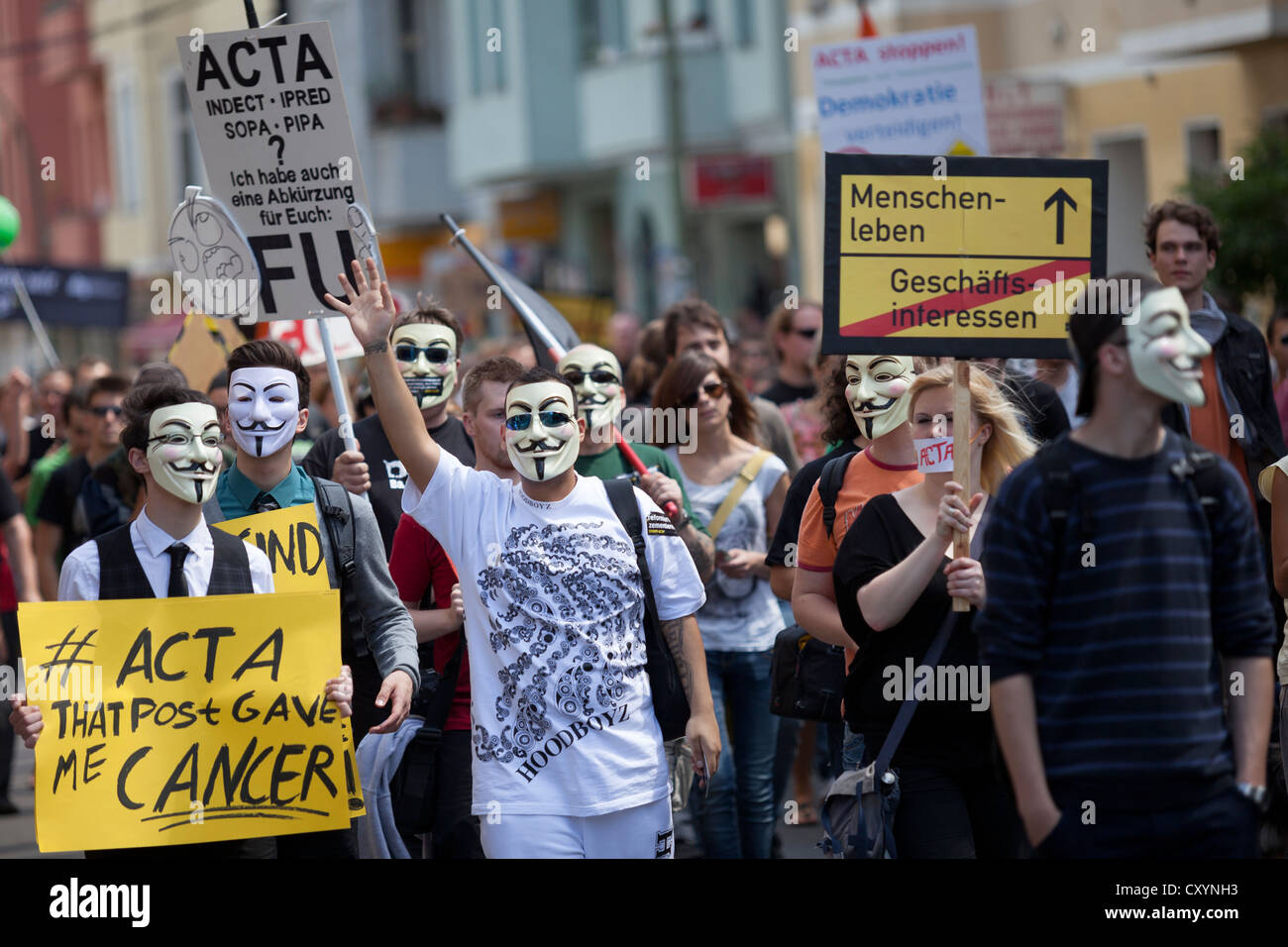 Masked demonstrators at protest against the controversial anti-piracy ...