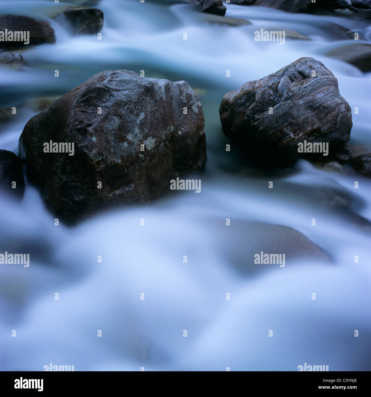 Stream flowing boulders hi-res stock photography and images - Alamy