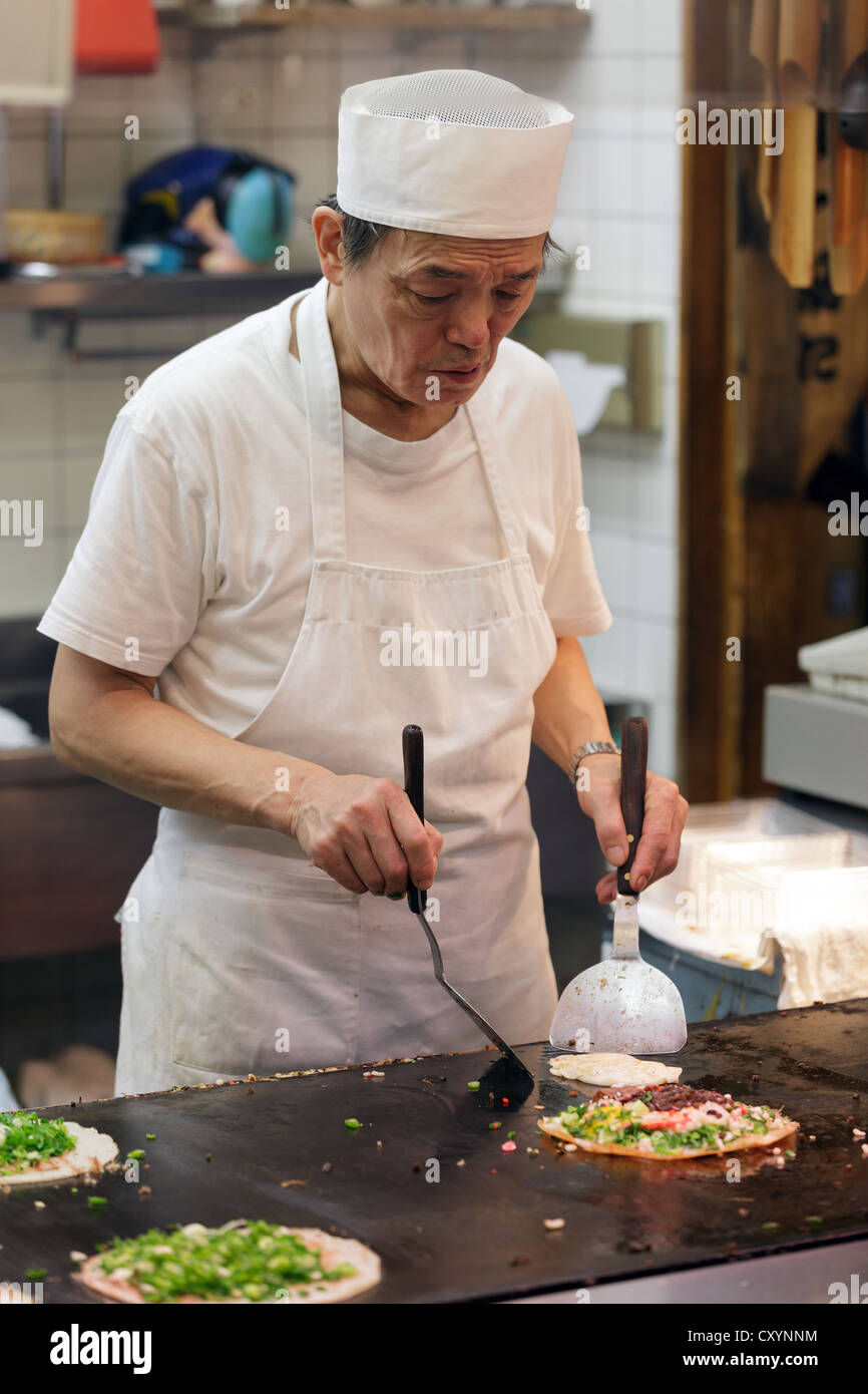 Japanese chef cooking in Kyoto restaurant, Japan Stock Photo - Alamy