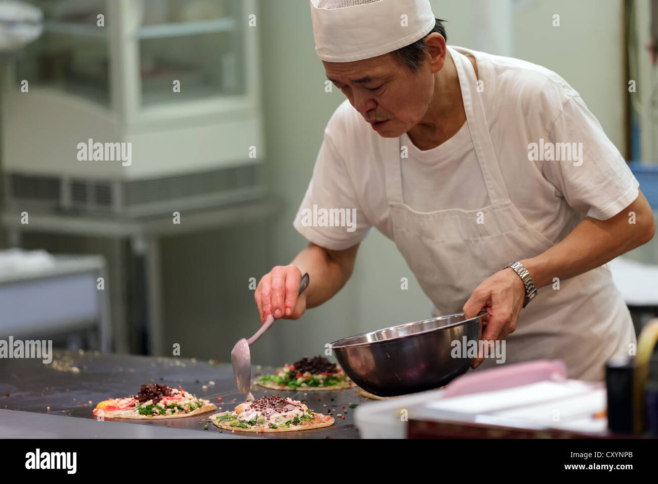 Japanese chef cooking in Kyoto restaurant, Japan Stock Photo - Alamy