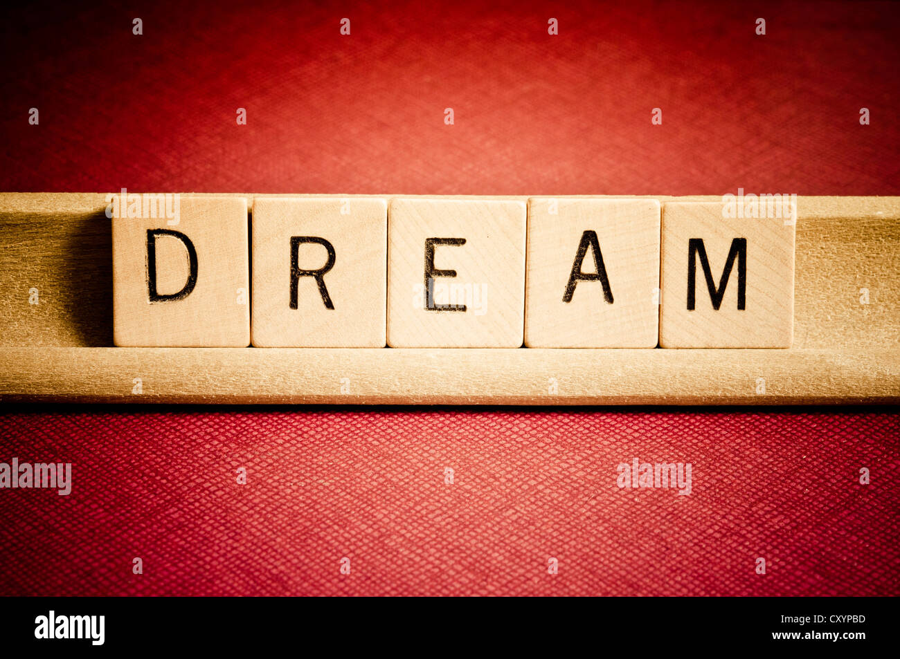 dream spelled with scrabble tiles Stock Photo - Alamy