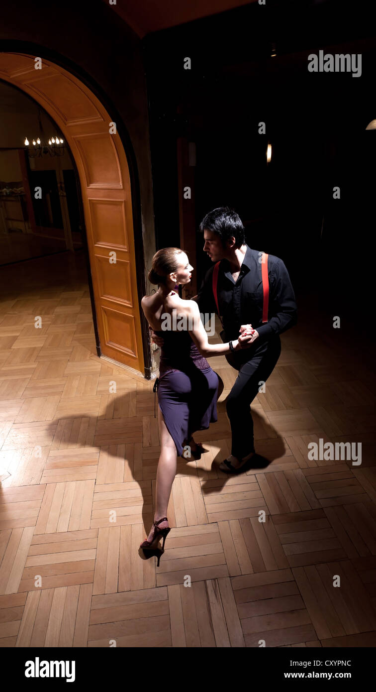 A man and a woman dancing argentinian tango. Please see more images ...