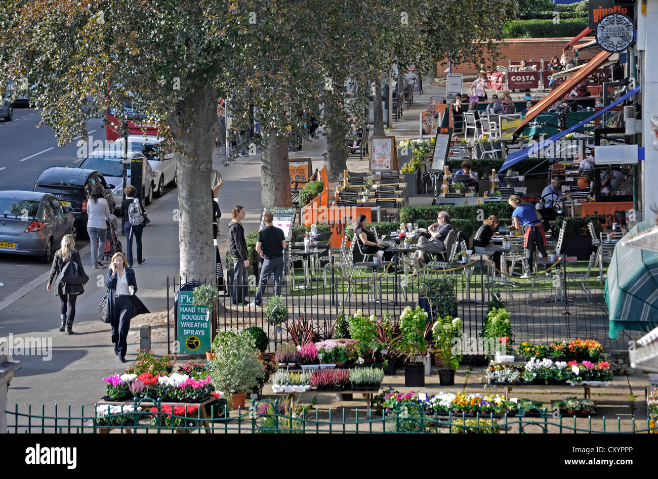 Belsize Park, Shops and local Cafe's with tables outside. London Stock ...