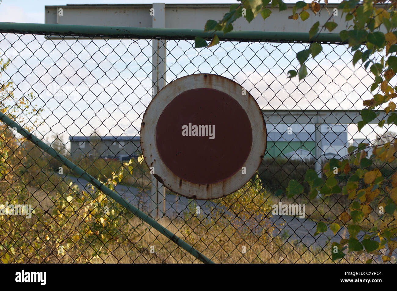 Rusted restriction sign on a metal fence Stock Photo - Alamy