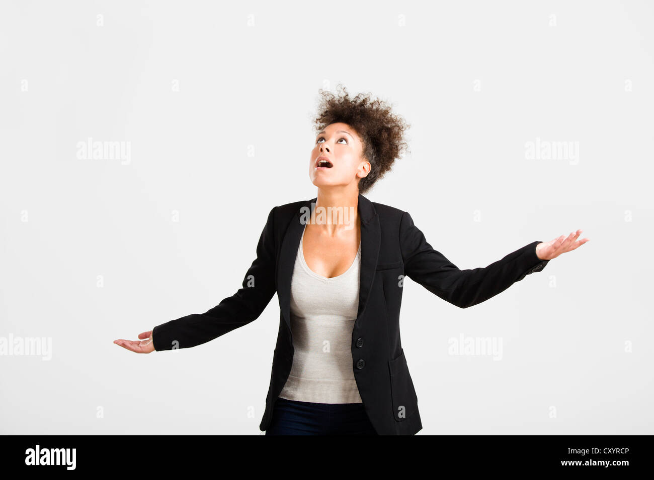 Business woman trying to catch something falling from the sky, isolated ...