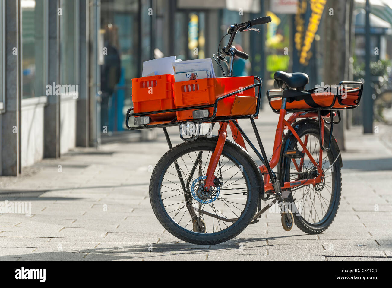 Postman's bicycle standing in the pedestrian zone, Grevenbroich, North ...