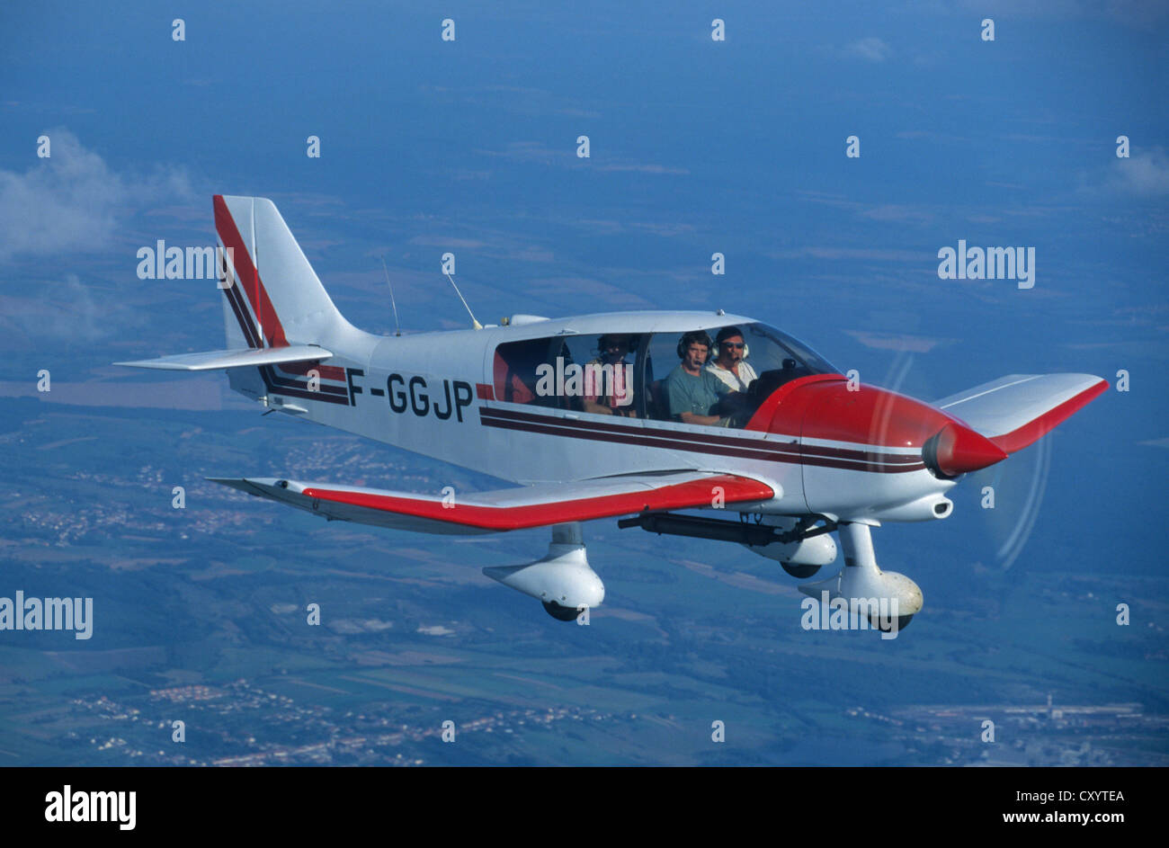 French plane Robin DR400-180 in flight over clouds, France Stock Photo ...
