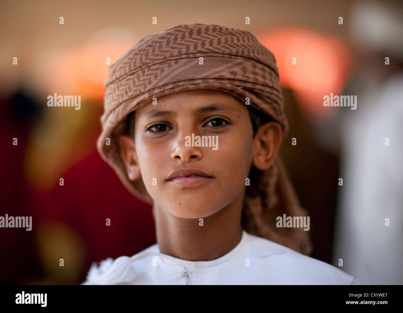 Portrait Of Bedouin Boy Wearing Turban, Sinaw, Oman Stock Photo - Alamy
