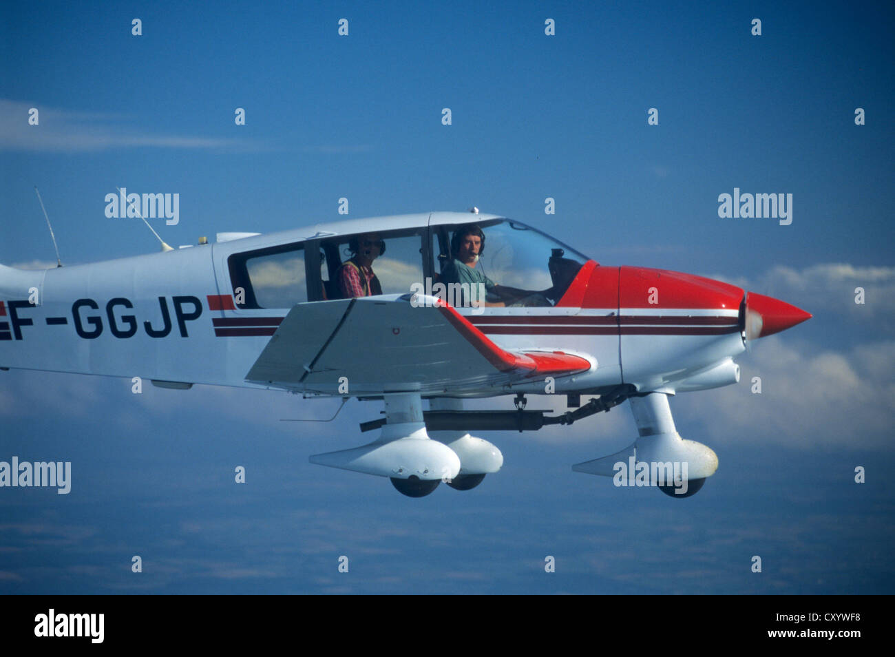 French plane Robin DR400-180 in flight over clouds, France Stock Photo ...