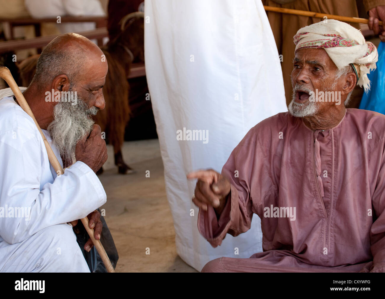 Two old men bargaining in hi-res stock photography and images - Alamy