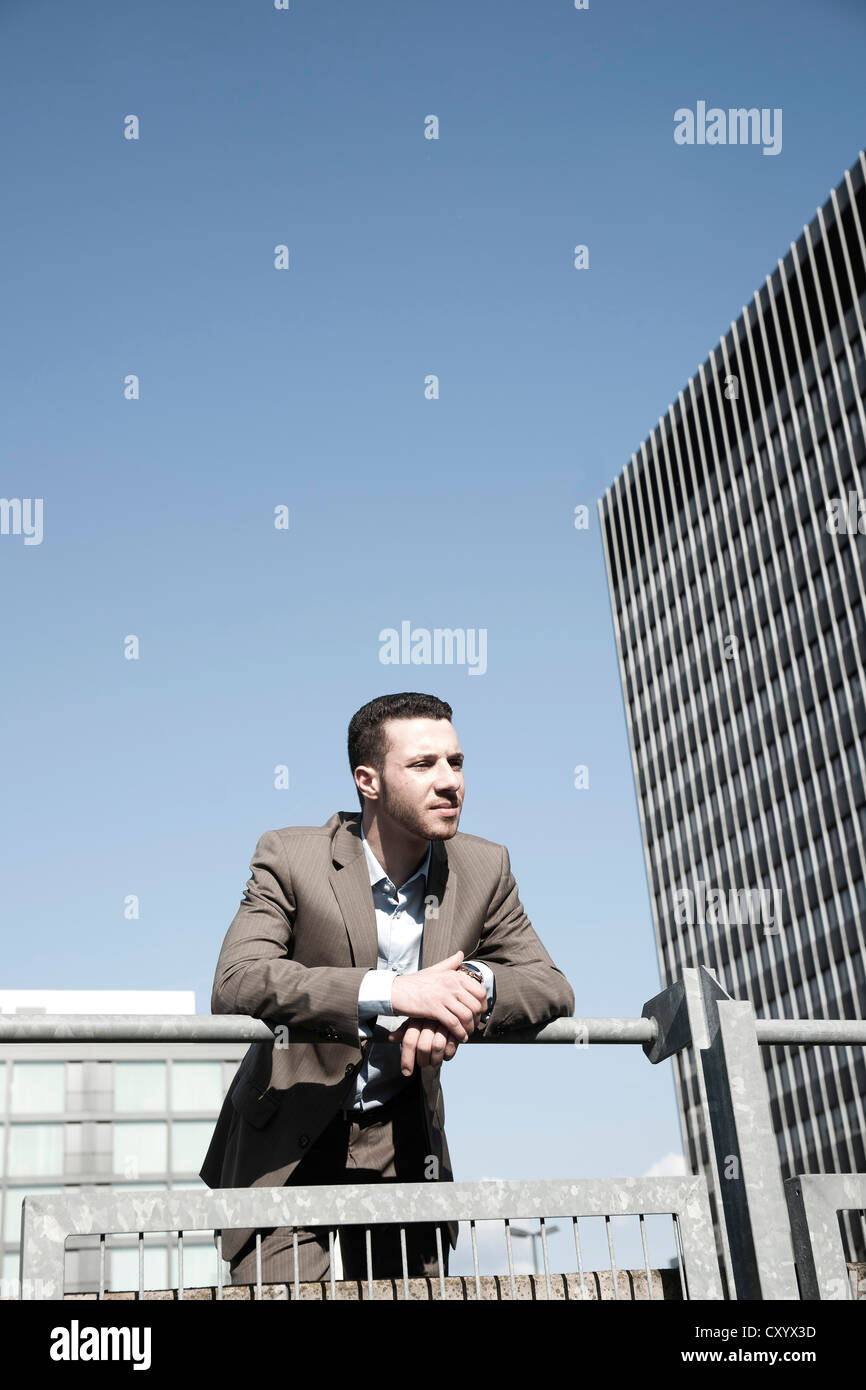 Old man leaning railings hi-res stock photography and images - Alamy