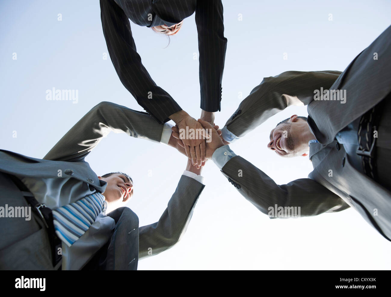 Team work three human hands hi-res stock photography and images - Alamy
