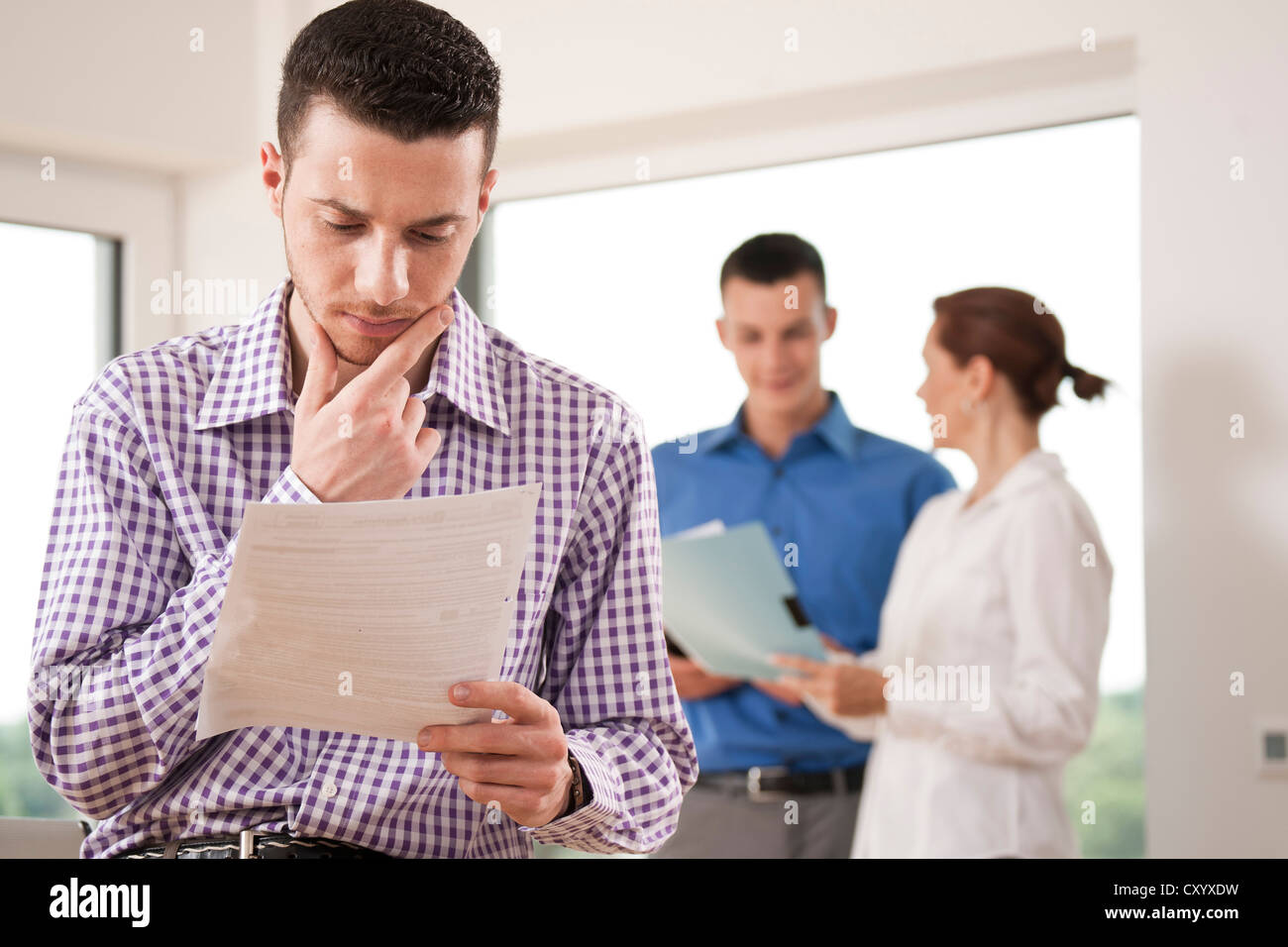 Male person working documents hi-res stock photography and images - Alamy