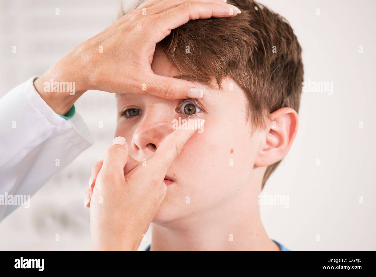 Inspecting eye glasses hi-res stock photography and images - Alamy