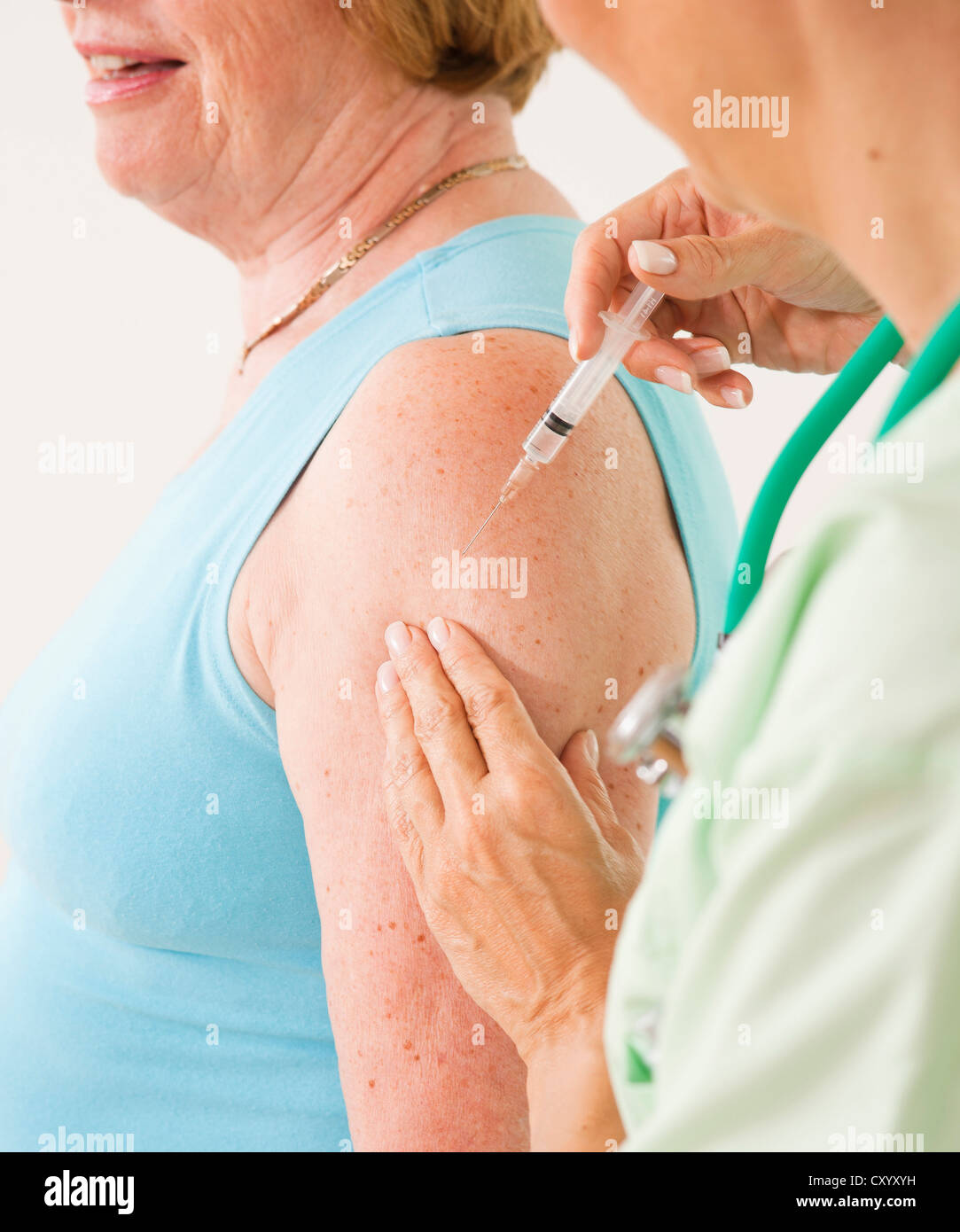 Receiving vaccines hi-res stock photography and images - Alamy