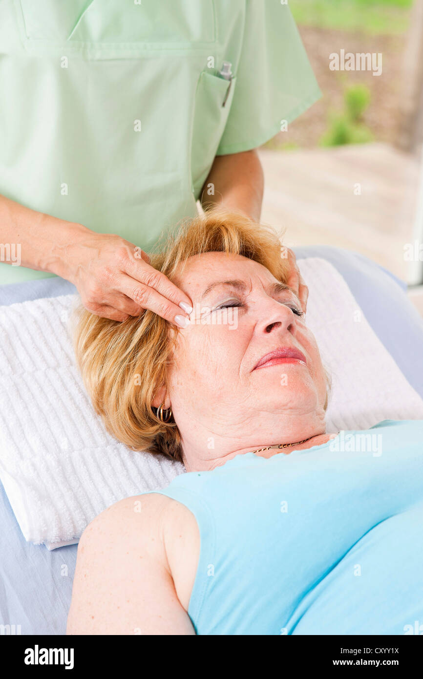 Masseur woman massage temples hi-res stock photography and images - Alamy