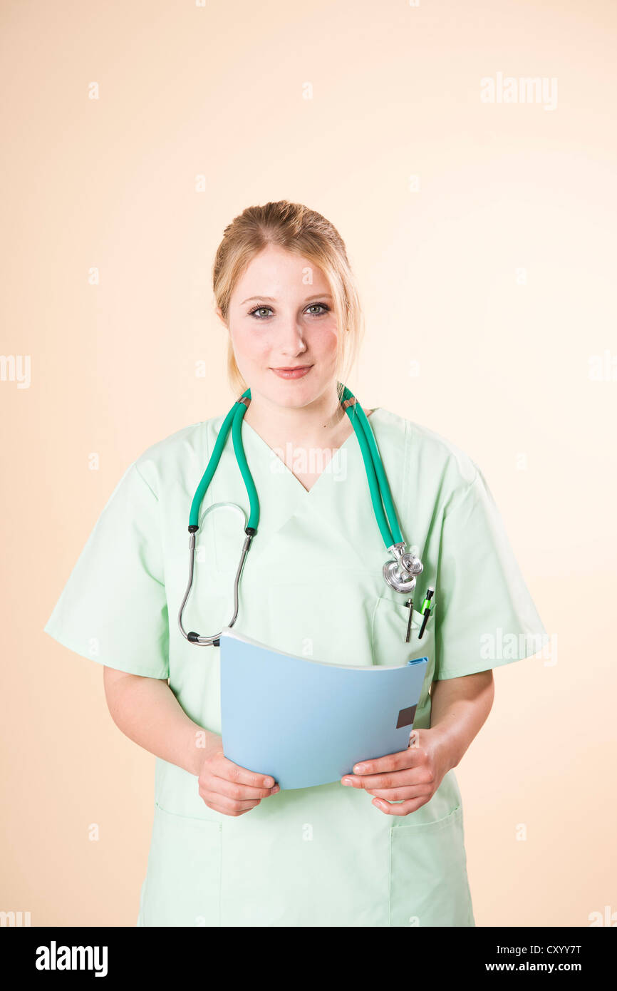 Smiling woman working schemes hi-res stock photography and images - Alamy