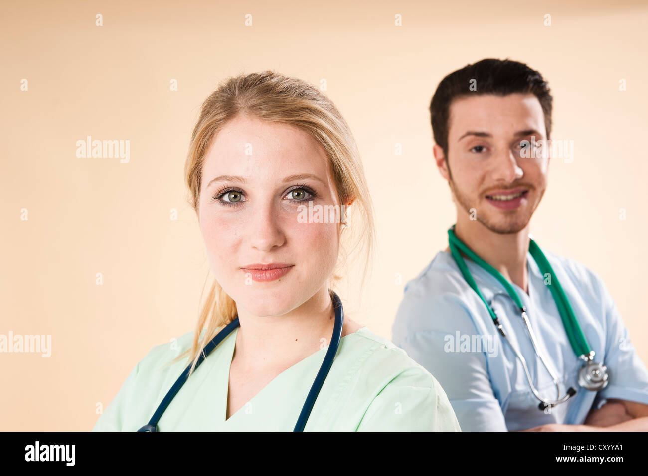 Male and female nurses Stock Photo - Alamy