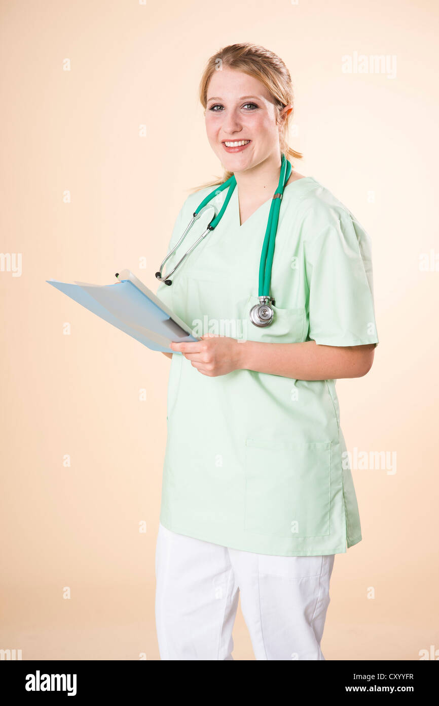 Nurse taking notes Stock Photo - Alamy