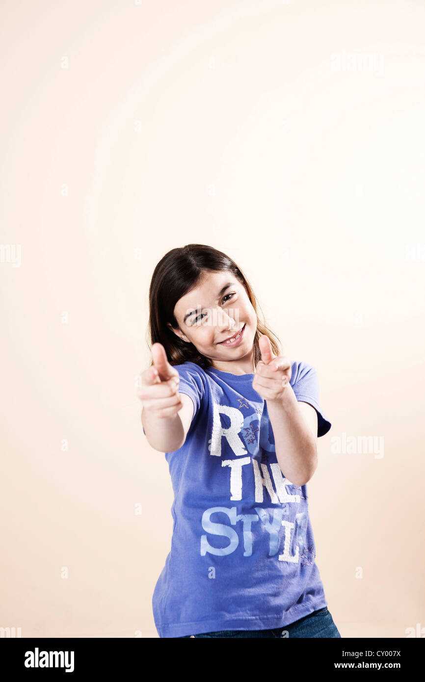 Girl making cool gestures Stock Photo - Alamy
