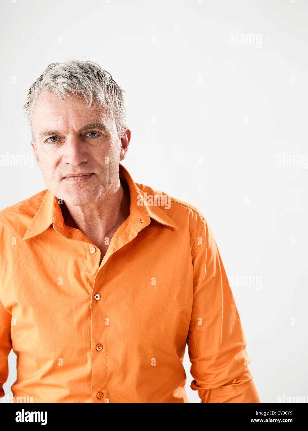 Businessman with a serious look, portrait Stock Photo - Alamy