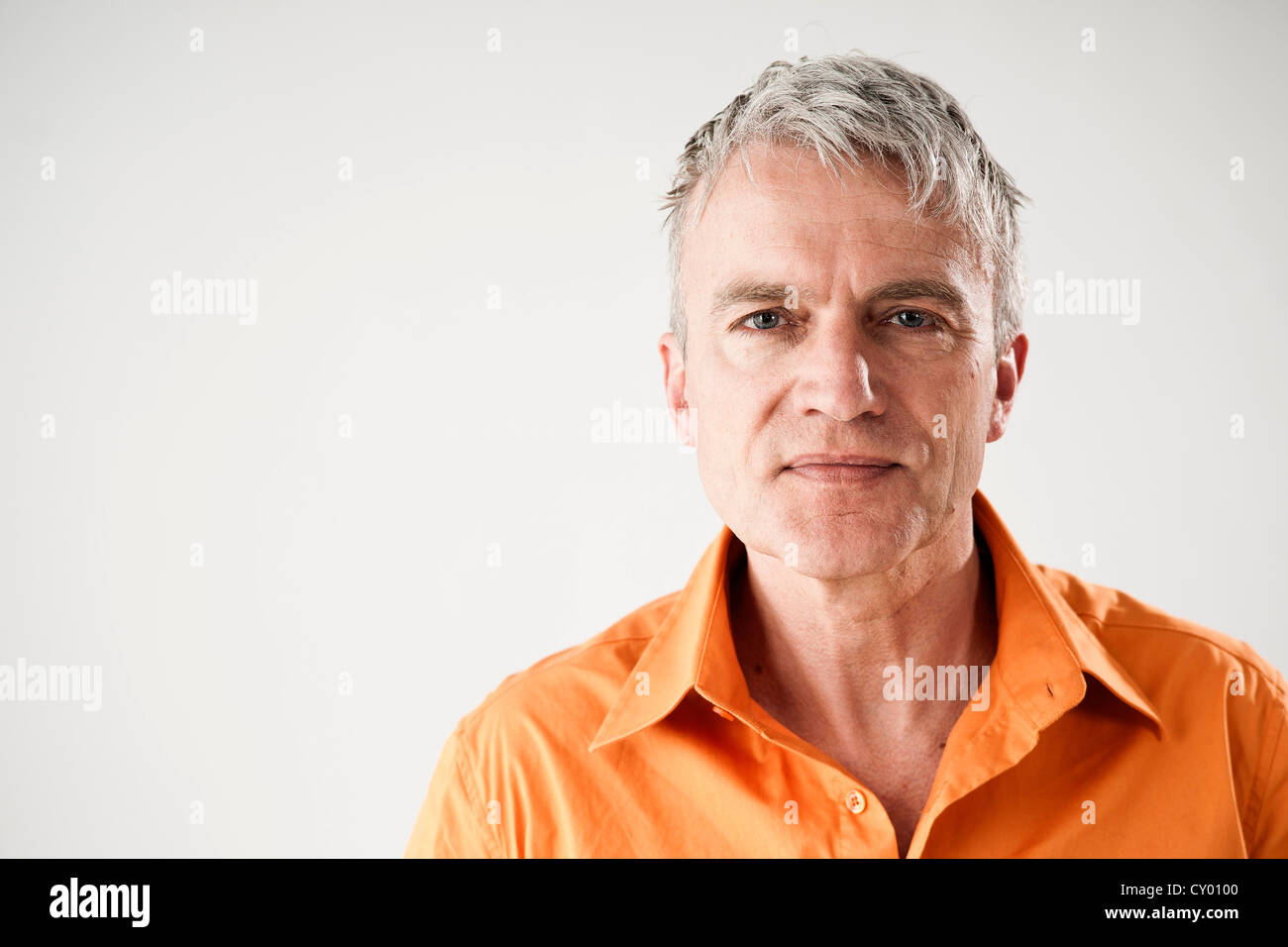 Businessman with a serious look, portrait Stock Photo - Alamy