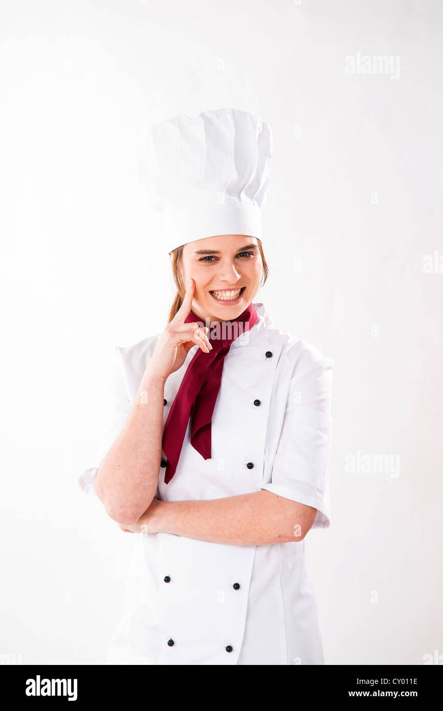 Young chef thinking Stock Photo - Alamy
