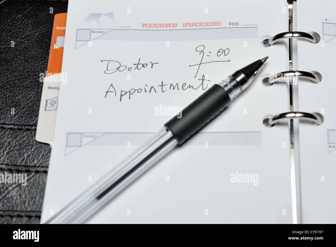 Doctor appointment words written on notebook Stock Photo - Alamy