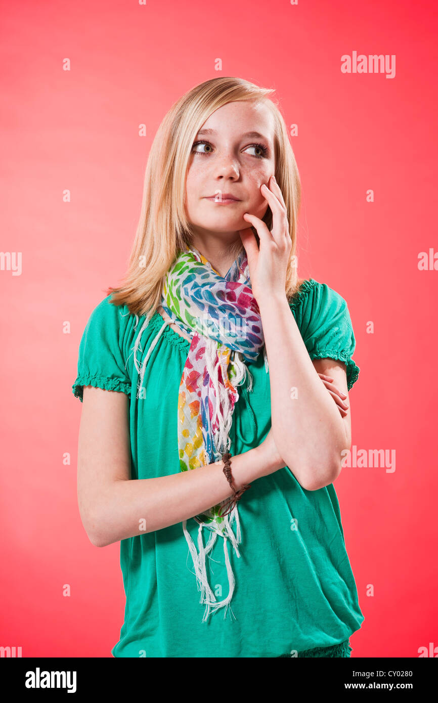 Thoughtful blonde girl Stock Photo - Alamy