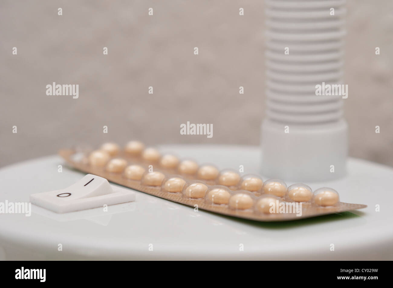 contraceptive pills on bedside table Stock Photo - Alamy