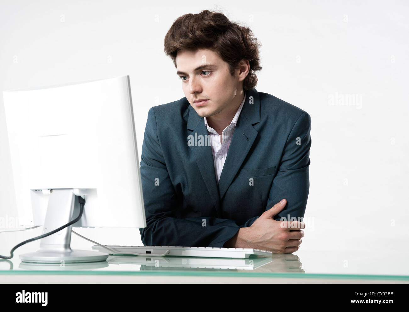 Concentrating in front monitor hi-res stock photography and images - Alamy