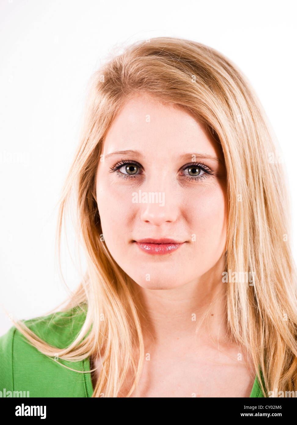 Serious young woman looks camera Cut Out Stock Images & Pictures - Alamy
