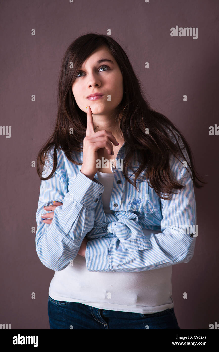 Girl with a skeptical expression Stock Photo - Alamy
