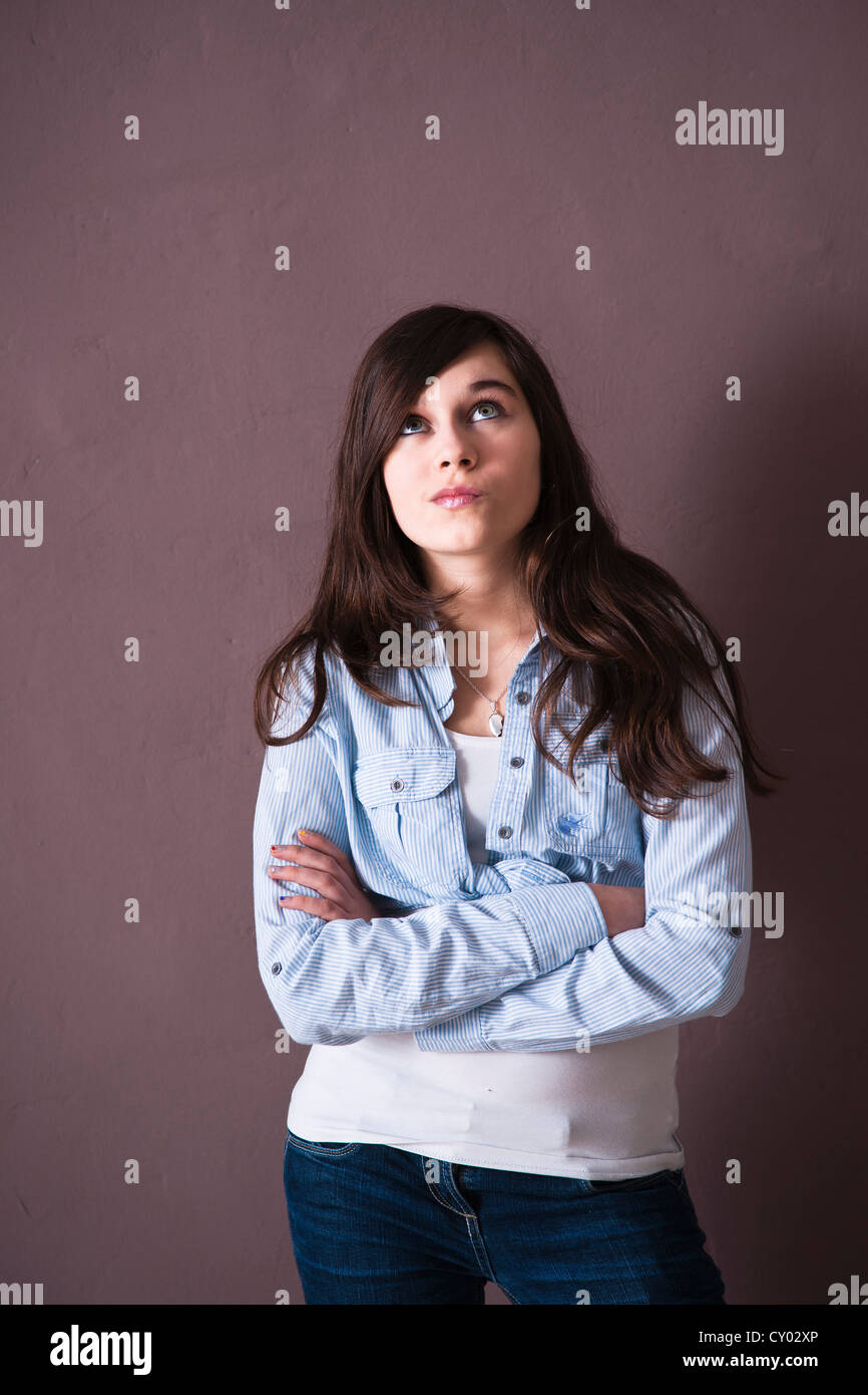 Girl with a skeptical expression Stock Photo - Alamy