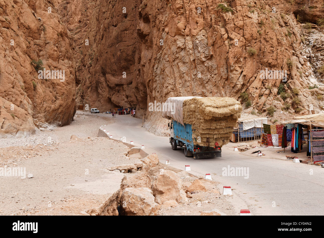 Fully loaded truck driving through the Todra Gorge, Gorges du Todra ...