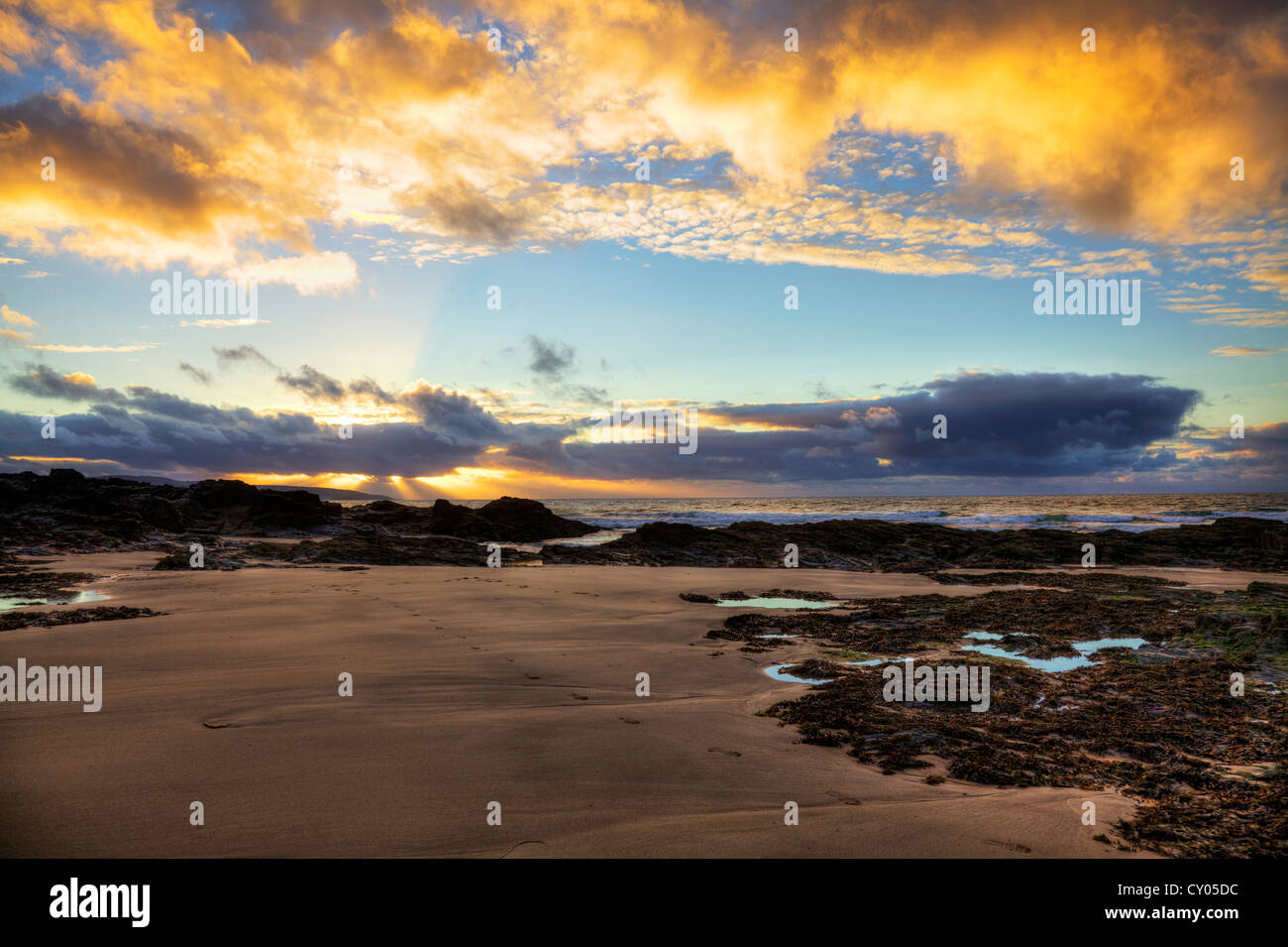 Sun going down, sunset over Hayle Beach, Cornwall, UK, England rugged ...