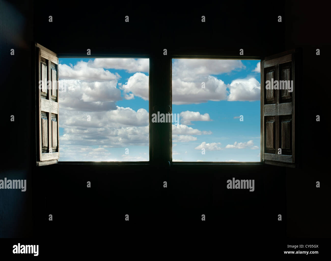 Window view and blue cloudy sky. Two opened windows Stock Photo - Alamy