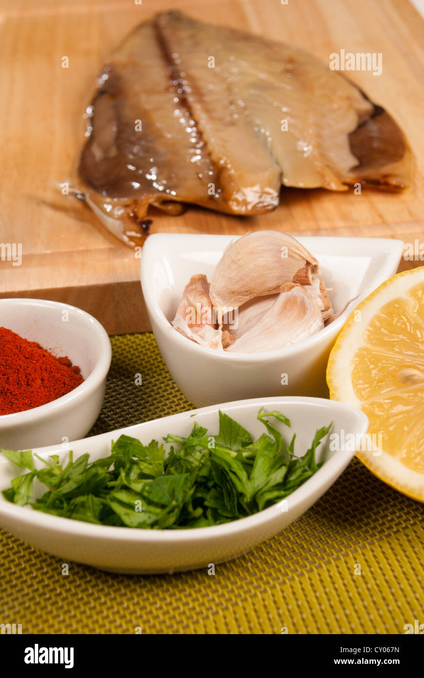 A dried mackerel about to be marinated Stock Photo - Alamy