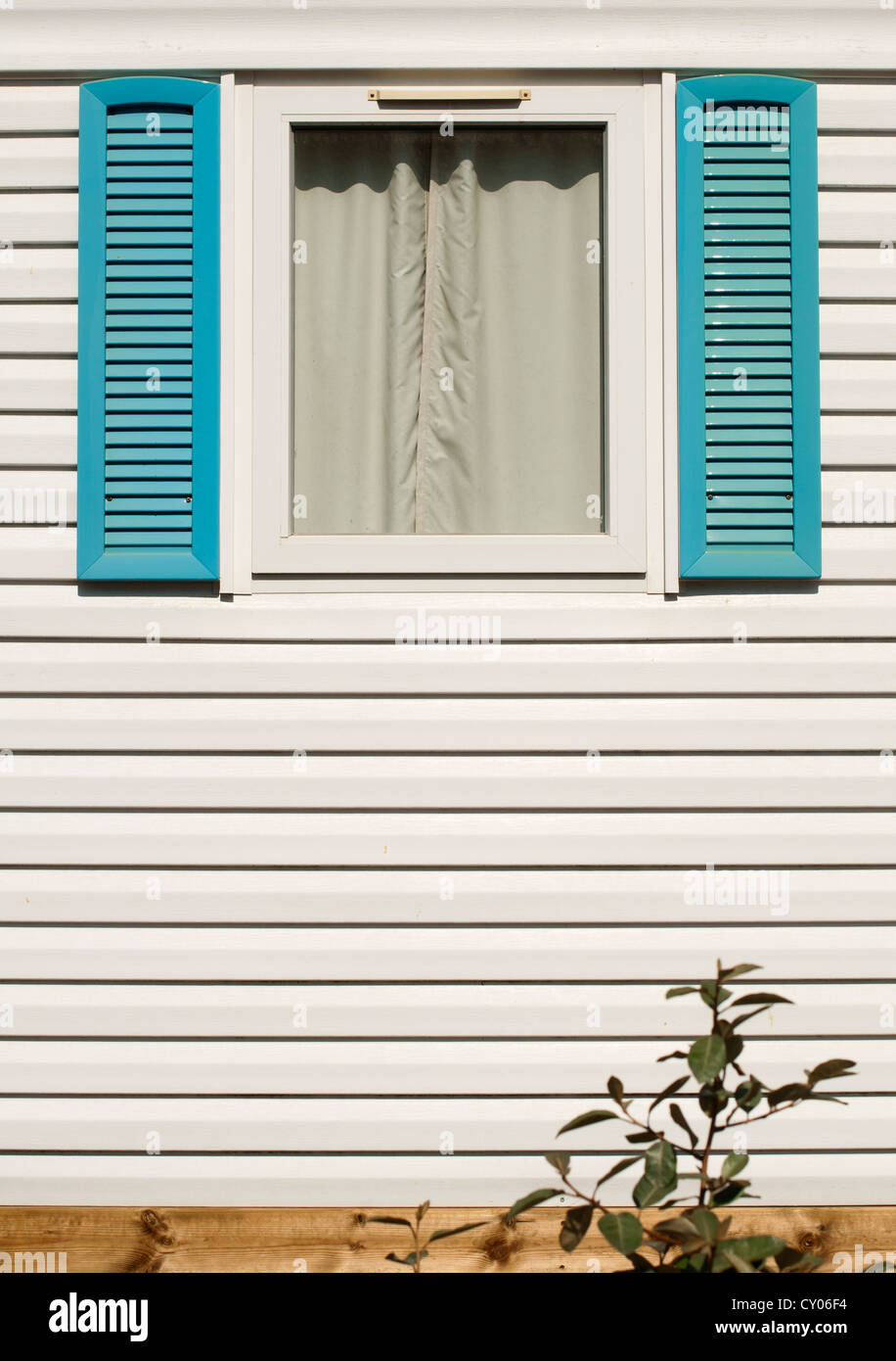 White window frame and blue shutter hi-res stock photography and images ...