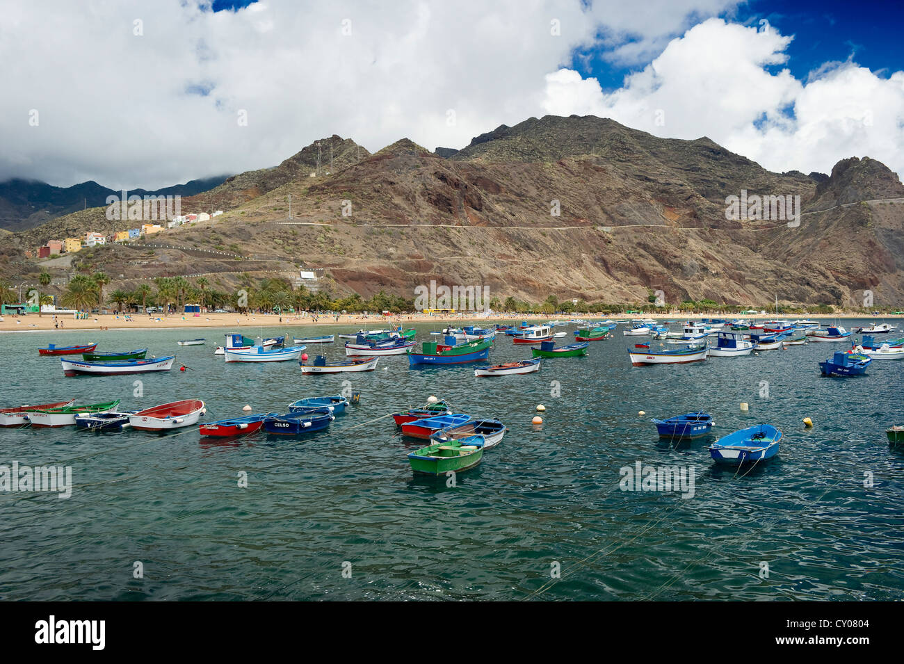 Colourful fishing boats and the Anaga Mountains, Playa de las Teresitas ...