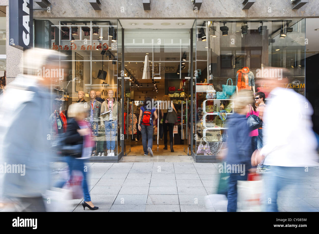 Pedestrian zone with people walking pass, motion blur, Stuttgart, Baden ...